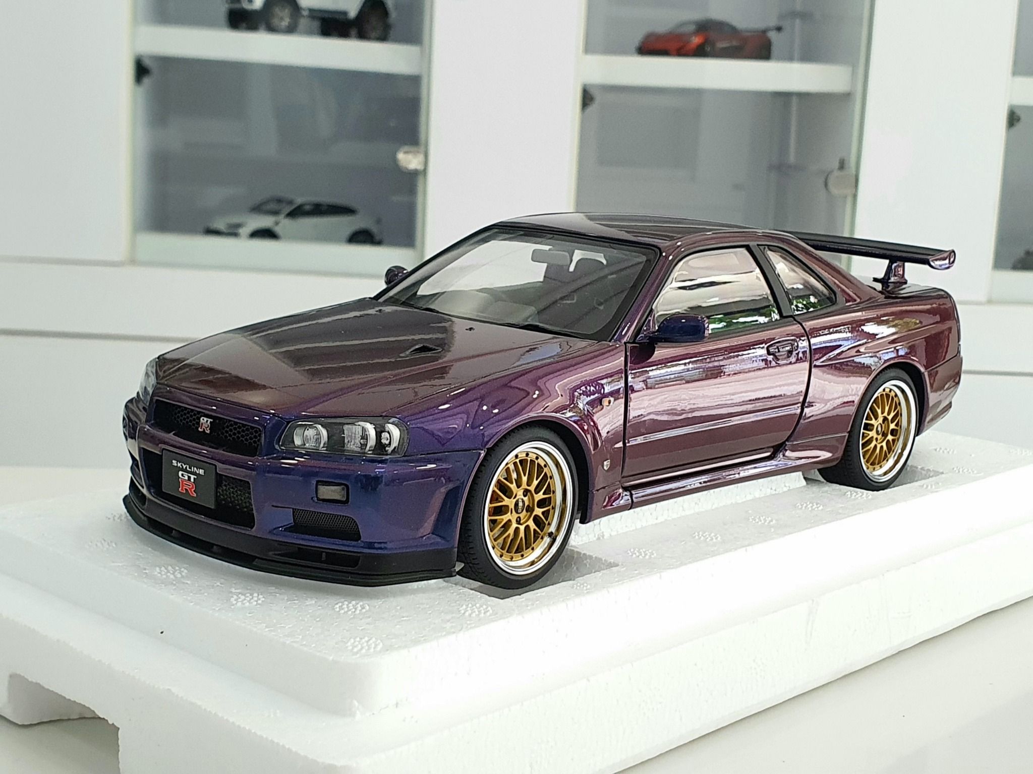 Xe Mô Hình Nissan Skyline GT-R ( R34 ) V-SPEC II 1:18 AUTOart ( Tím ) – Shop Xe Mô Hình Tĩnh