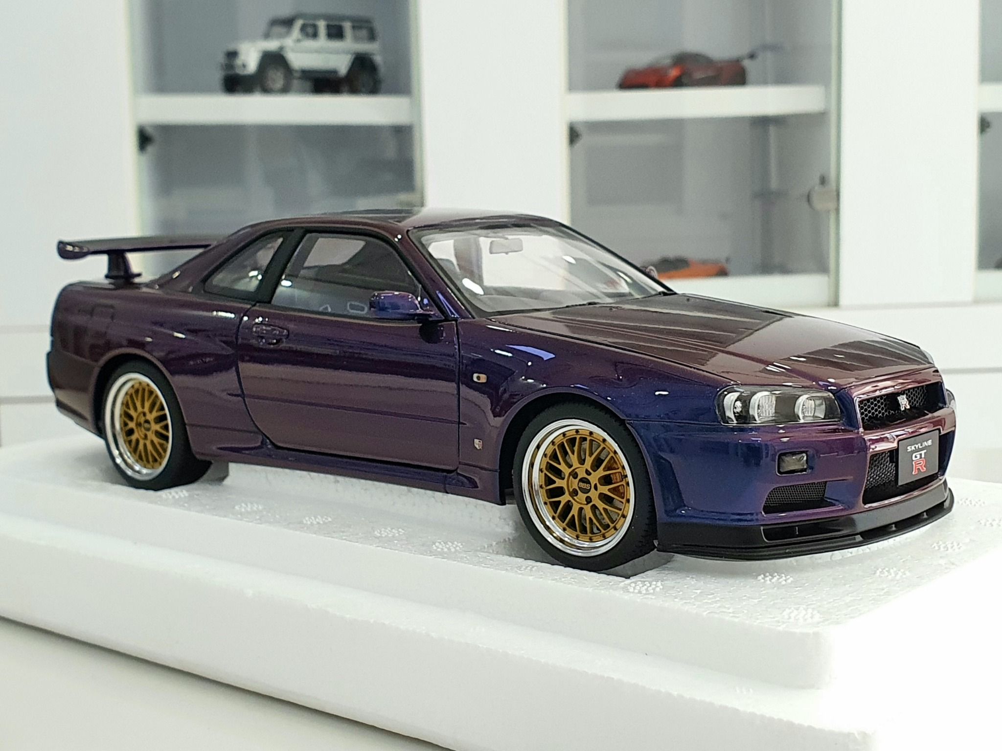 Xe Mô Hình Nissan Skyline GT-R ( R34 ) V-SPEC II 1:18 AUTOart ( Tím ) – Shop Xe Mô Hình Tĩnh