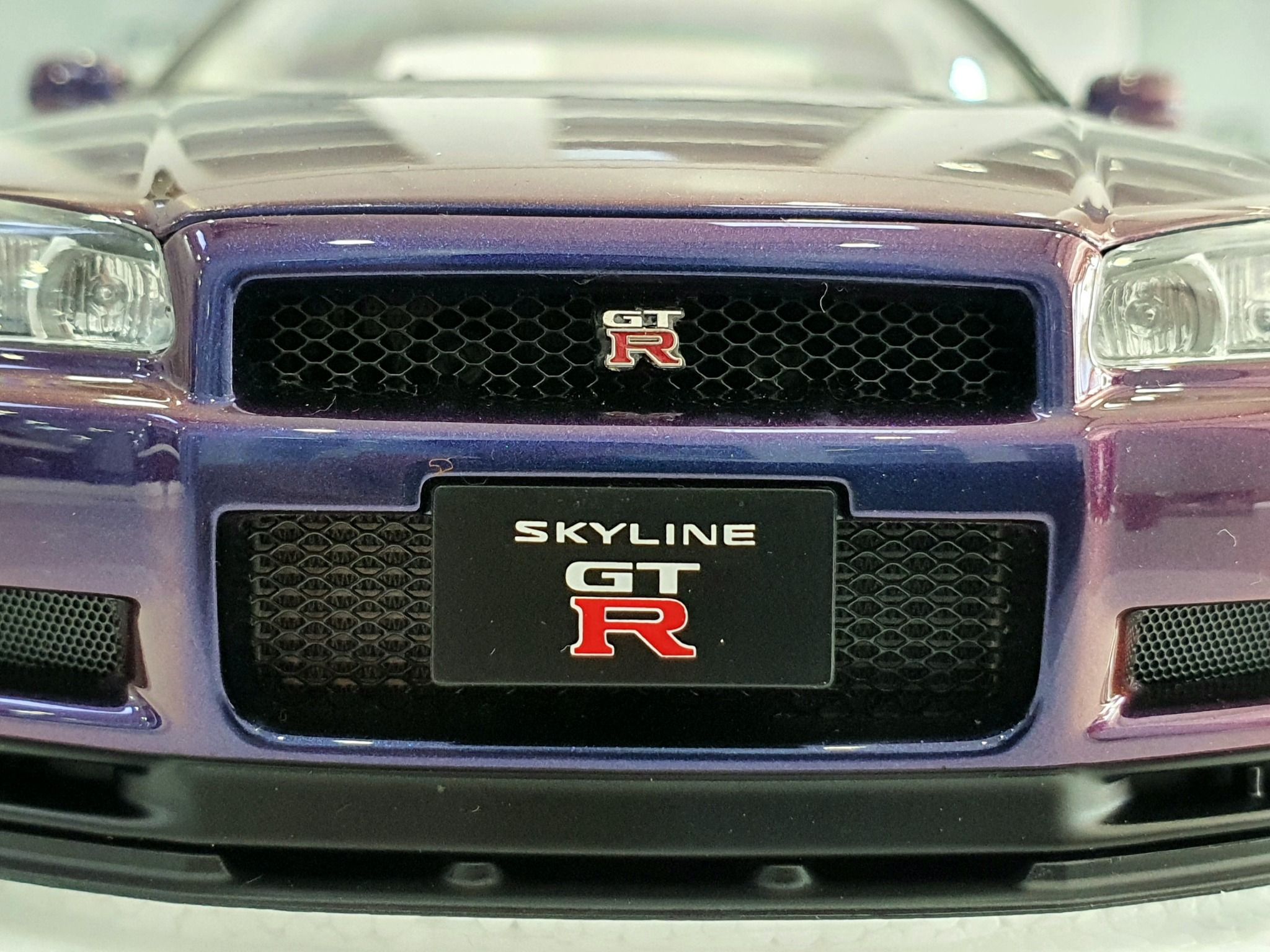 Xe Mô Hình Nissan Skyline GT-R ( R34 ) V-SPEC II 1:18 AUTOart ( Tím ) – Shop Xe Mô Hình Tĩnh