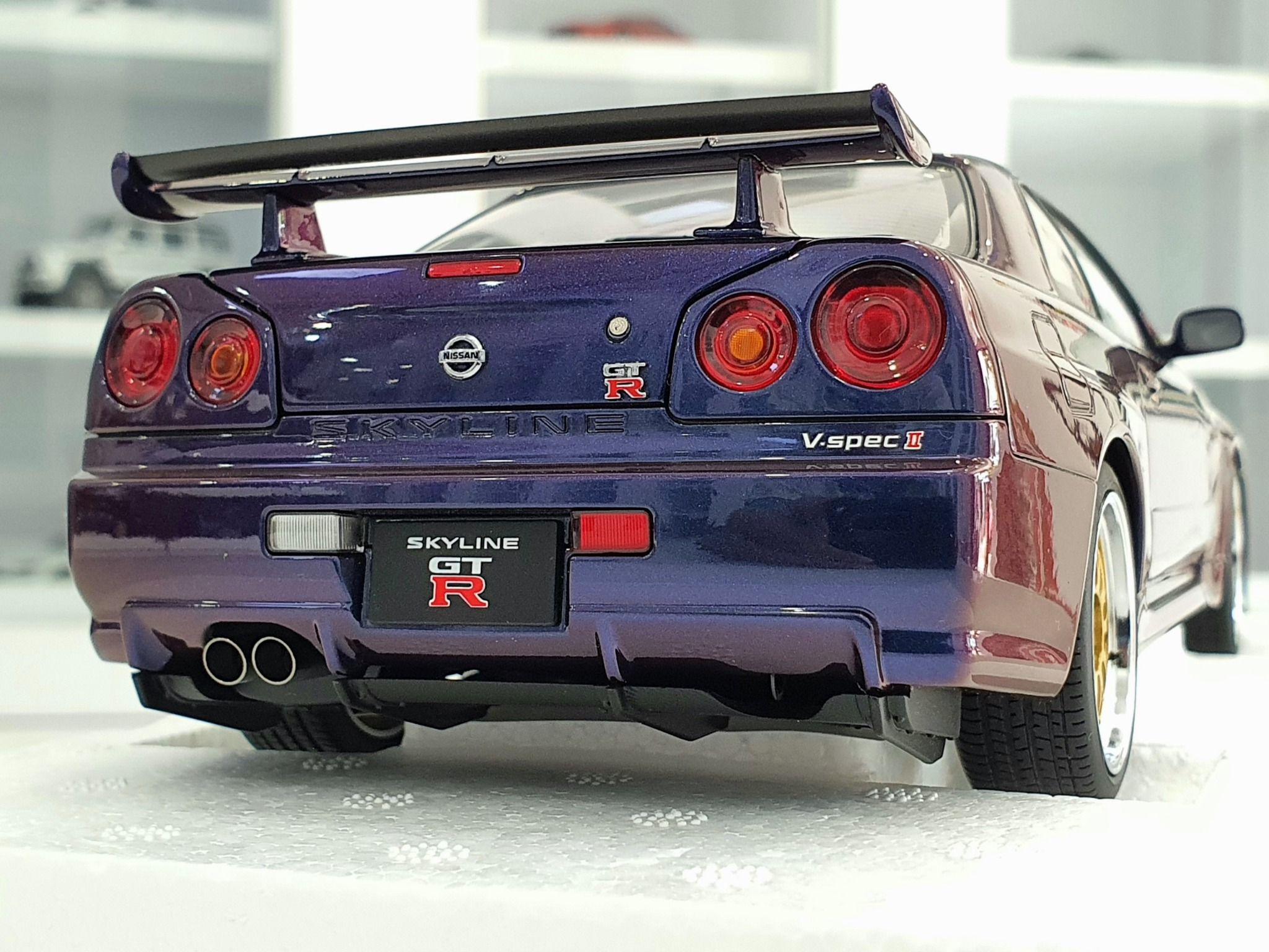 Xe Mô Hình Nissan Skyline GT-R ( R34 ) V-SPEC II 1:18 AUTOart ( Tím ) – Shop Xe Mô Hình Tĩnh