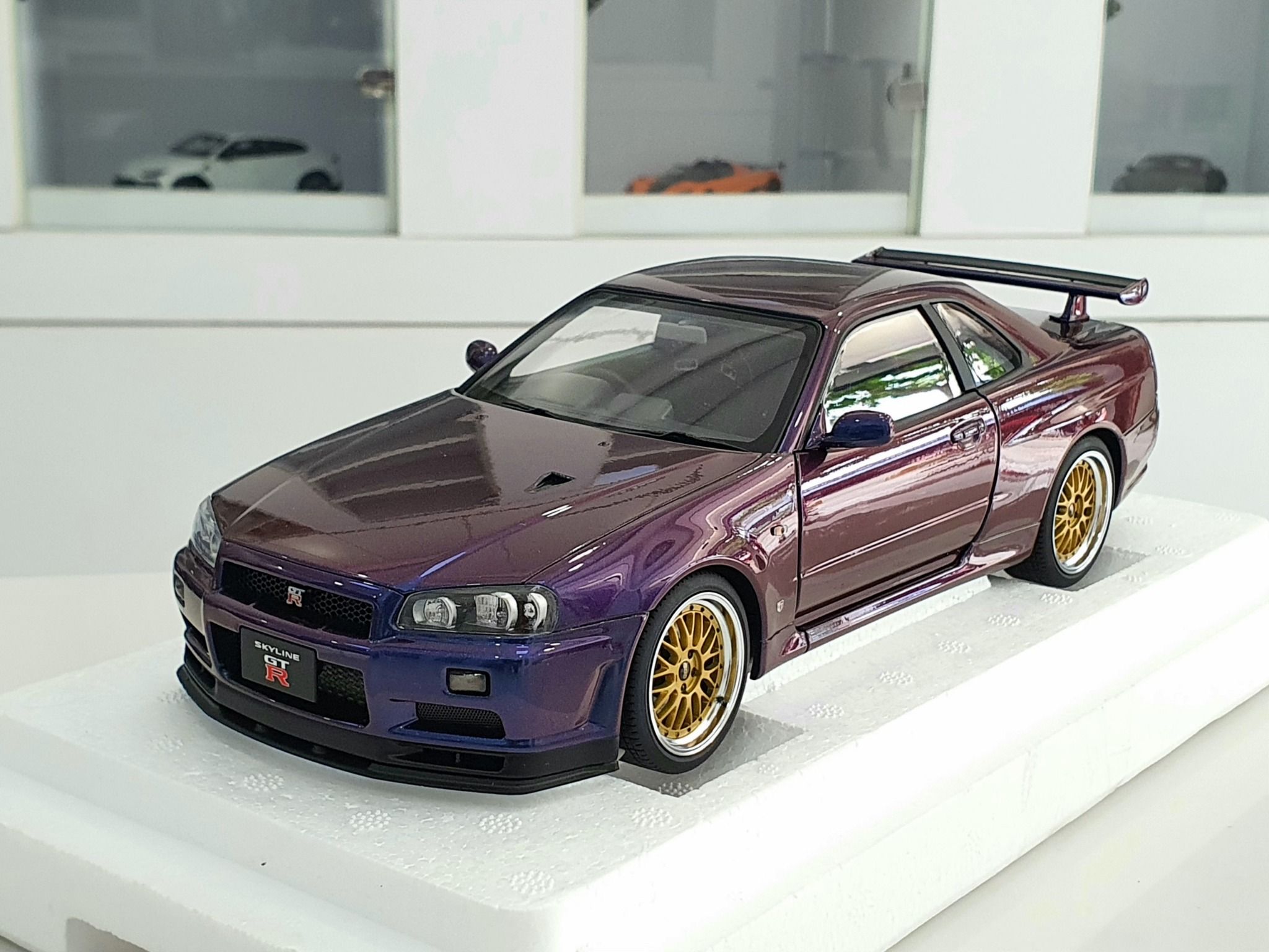 Xe Mô Hình Nissan Skyline GT-R ( R34 ) V-SPEC II 1:18 AUTOart ( Tím ) – Shop Xe Mô Hình Tĩnh