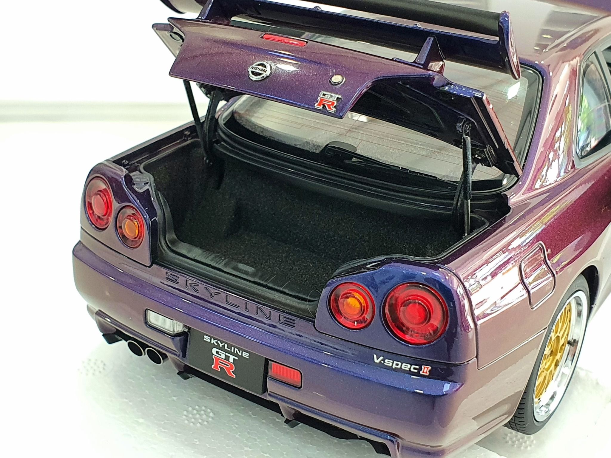 Xe Mô Hình Nissan Skyline GT-R ( R34 ) V-SPEC II 1:18 AUTOart ( Tím ) – Shop Xe Mô Hình Tĩnh