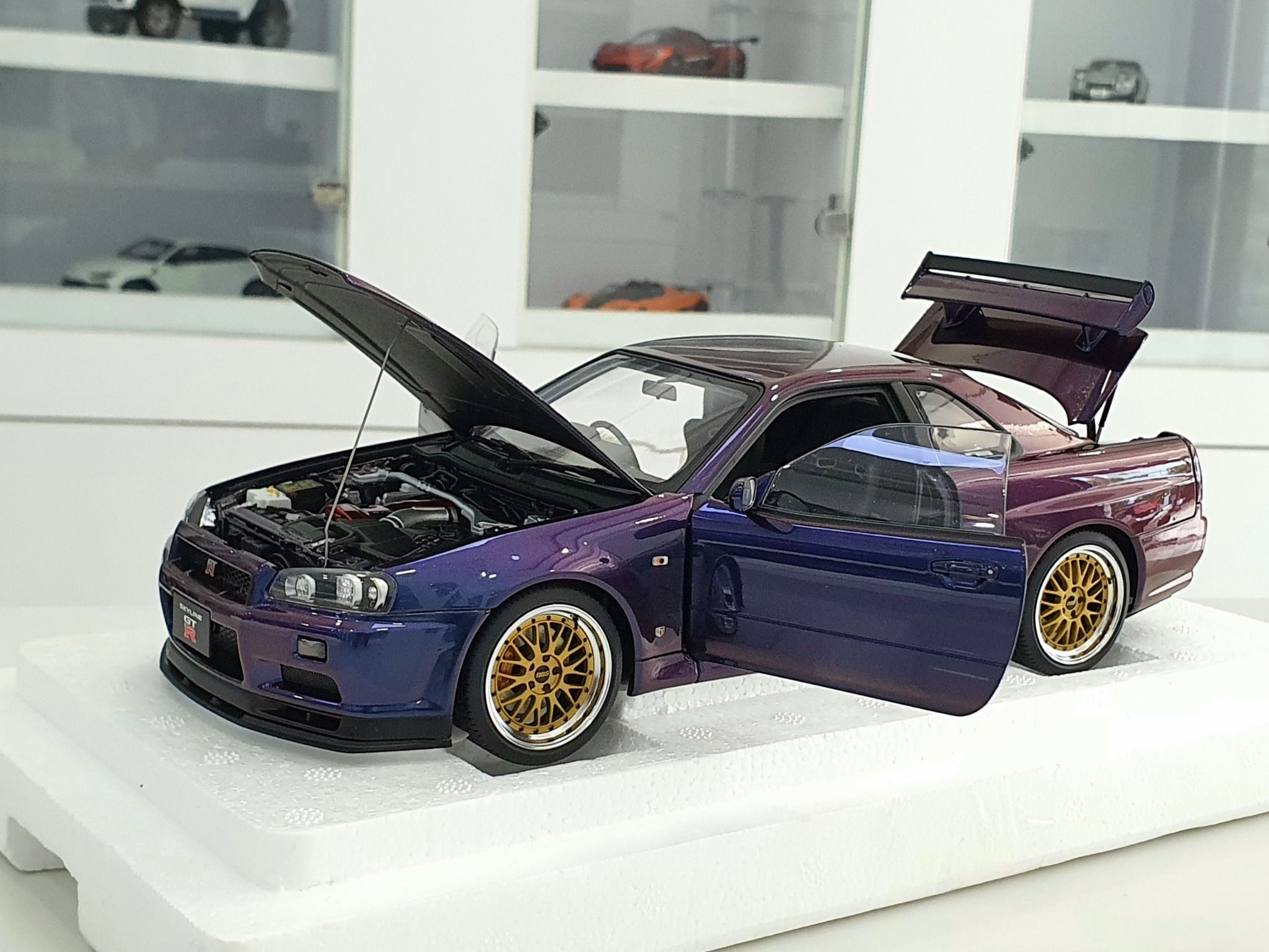 Xe Mô Hình Nissan Skyline GT-R ( R34 ) V-SPEC II 1:18 AUTOart ( Tím ) – Shop Xe Mô Hình Tĩnh
