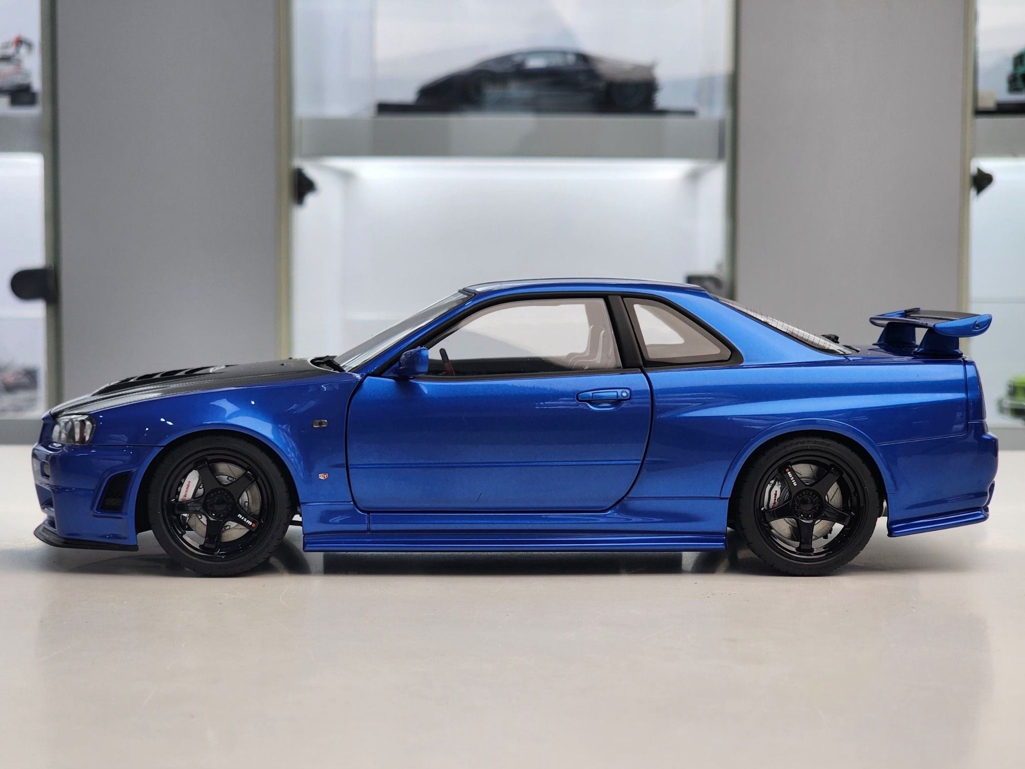 Xe Mô Hình NISMO R34 GT-R Z-tune 1:18 AUTOart ( BAYSIDE BLUE W/ CARBON ...