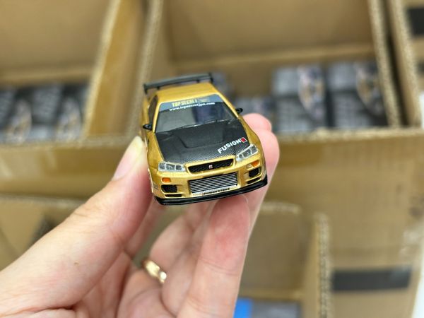 Xe Mô Hình Nissan Skyline GT-R (R34) Top Secret Top Secret Gold - Japa ...