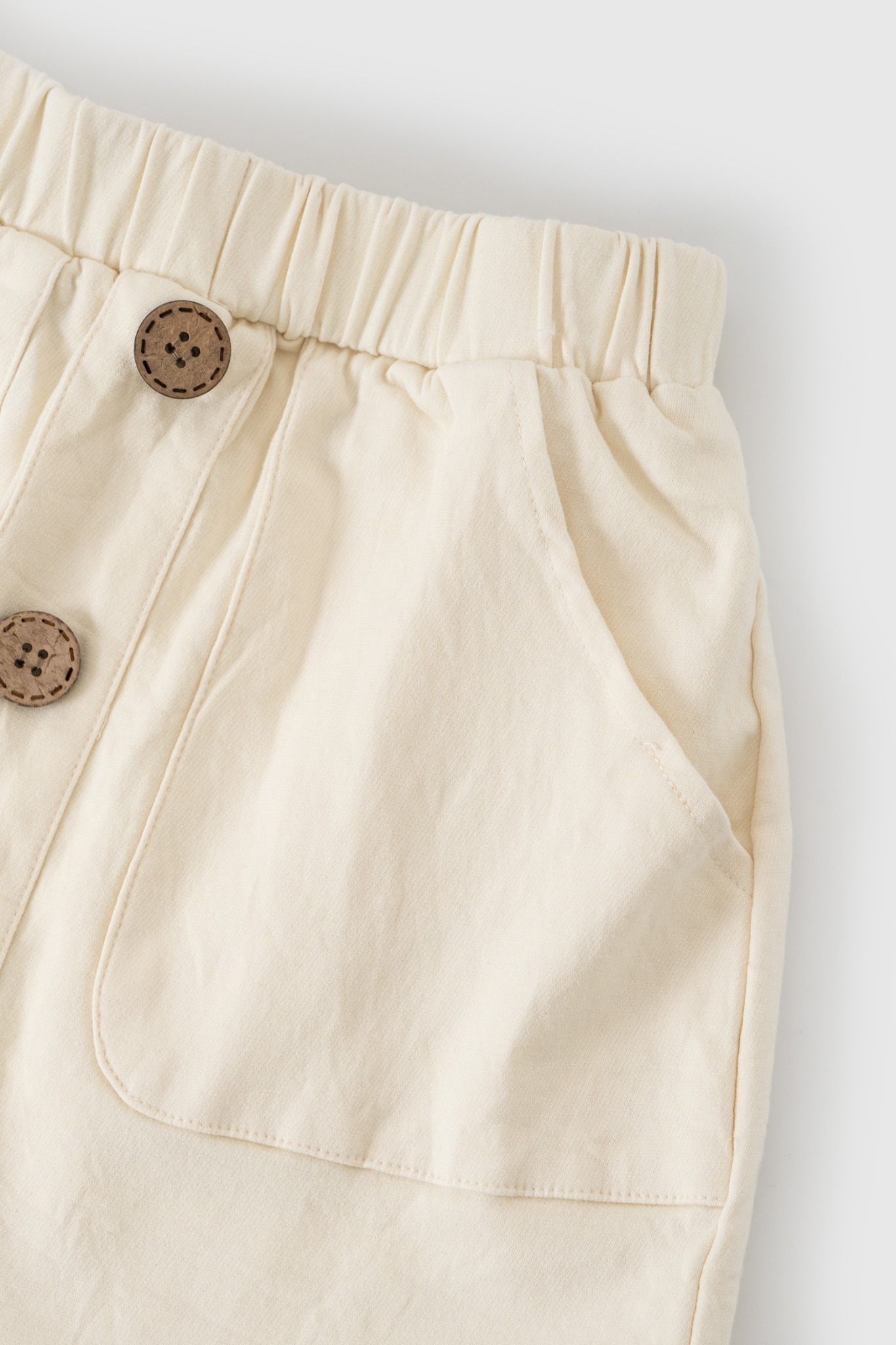 Chân Váy kaki Bé Gái Dễ Thương Lưng Thun Và Túi Đắp Rabity - 92524