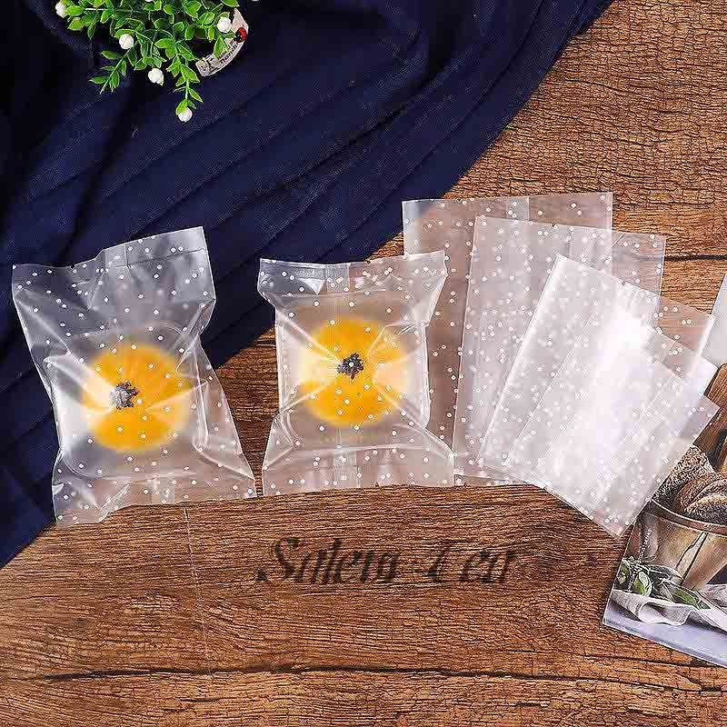 100 túi trắng mờ chấm bi hàn miệng đựng bánh kẹo, trà