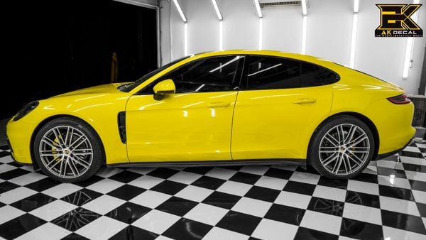 Porsche Panamera wrap đổi màu Glossy Yellow cực kỳ xịn xò – AK Premium