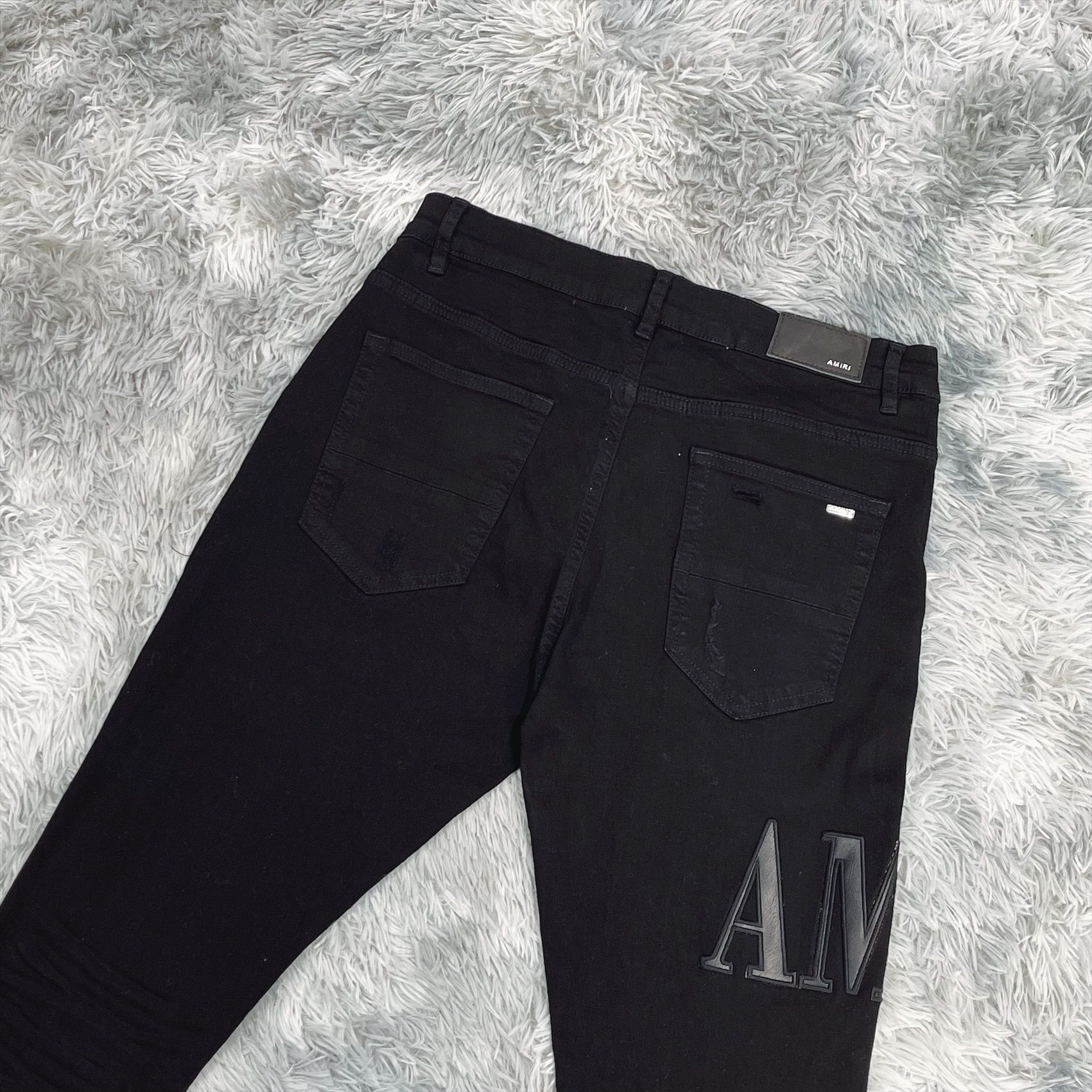 AMR Destroyed Embroidered Logo Jean - Black – EDDY