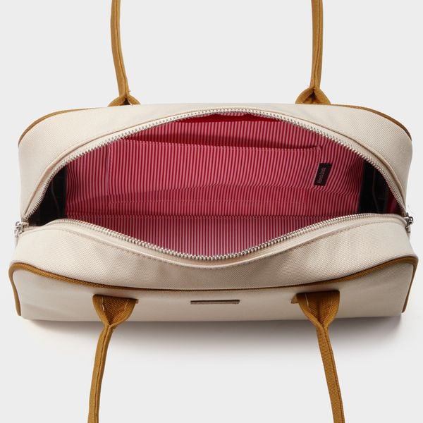 CROSSED BAGS - Camelia Brand