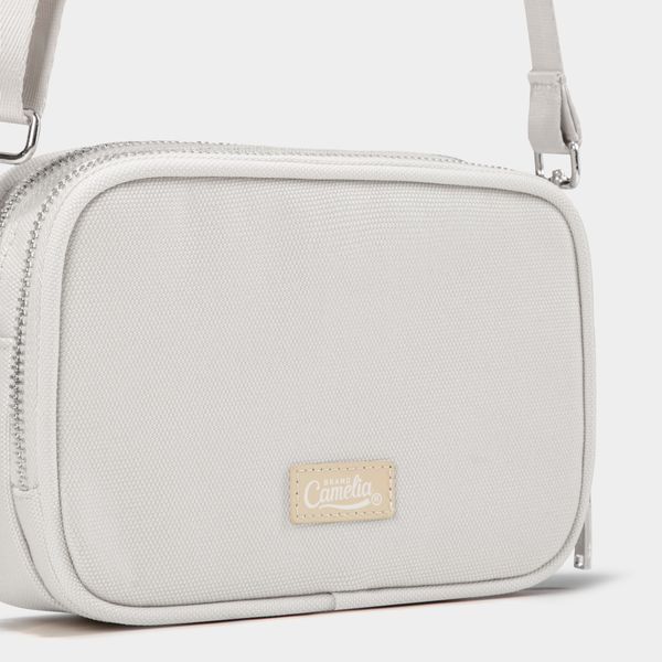 CROSSED BAGS - Camelia Brand
