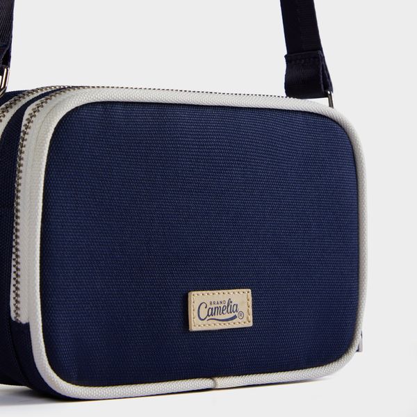 CROSSED BAGS - Camelia Brand