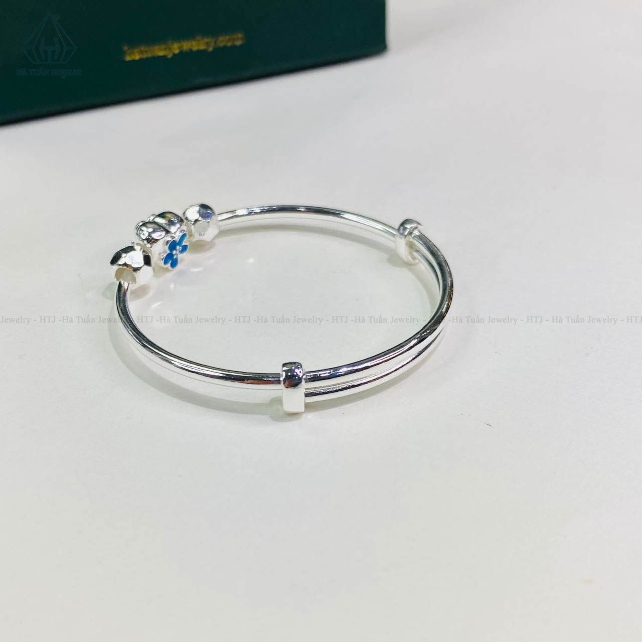 BB062 Lắc tay bé hoa xanh