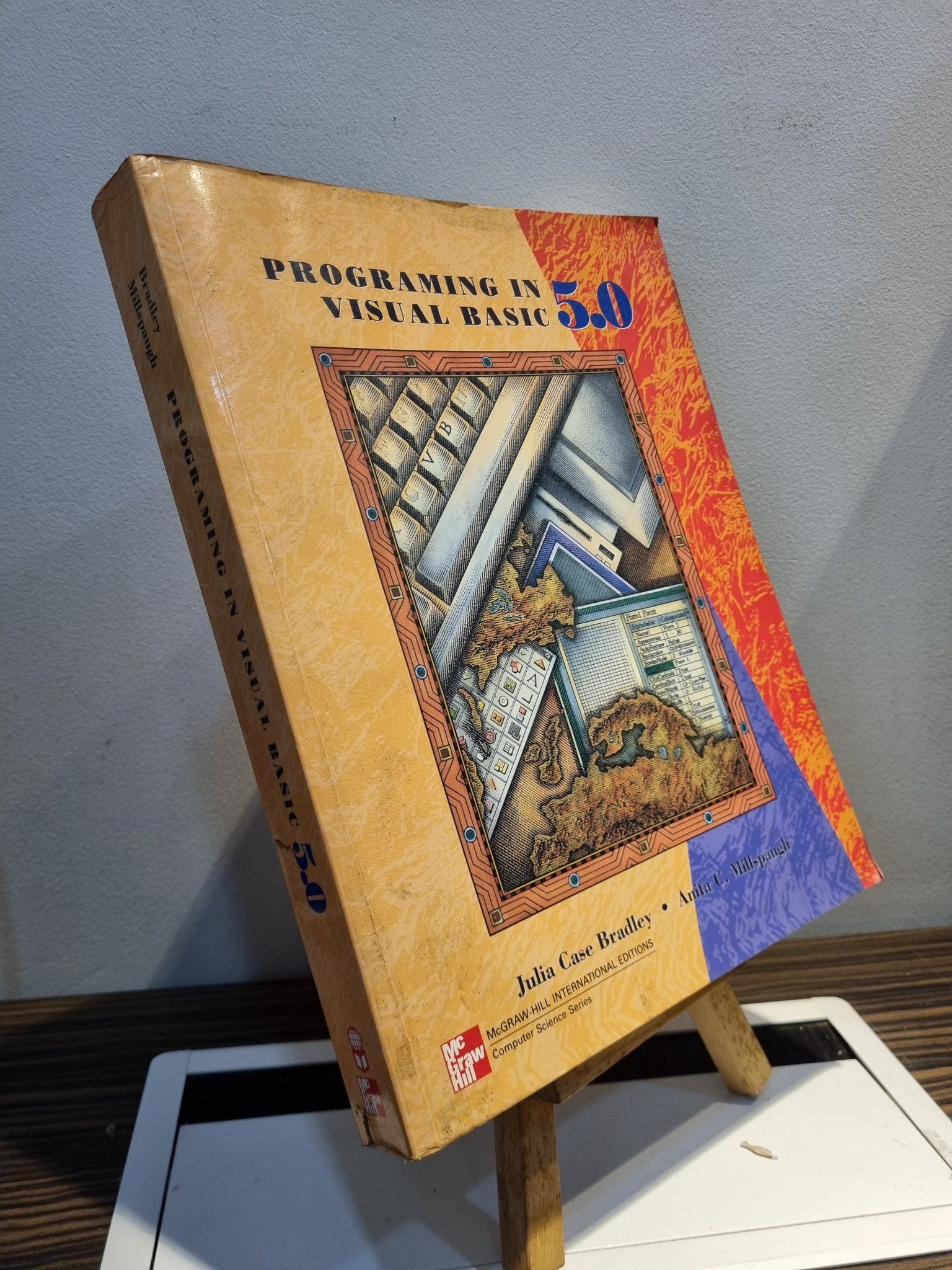 PROGRAMING IN VISUAL BASIC 5.0 - Julia Case Bradley & Anita C. Millspa – Momo Bookstore