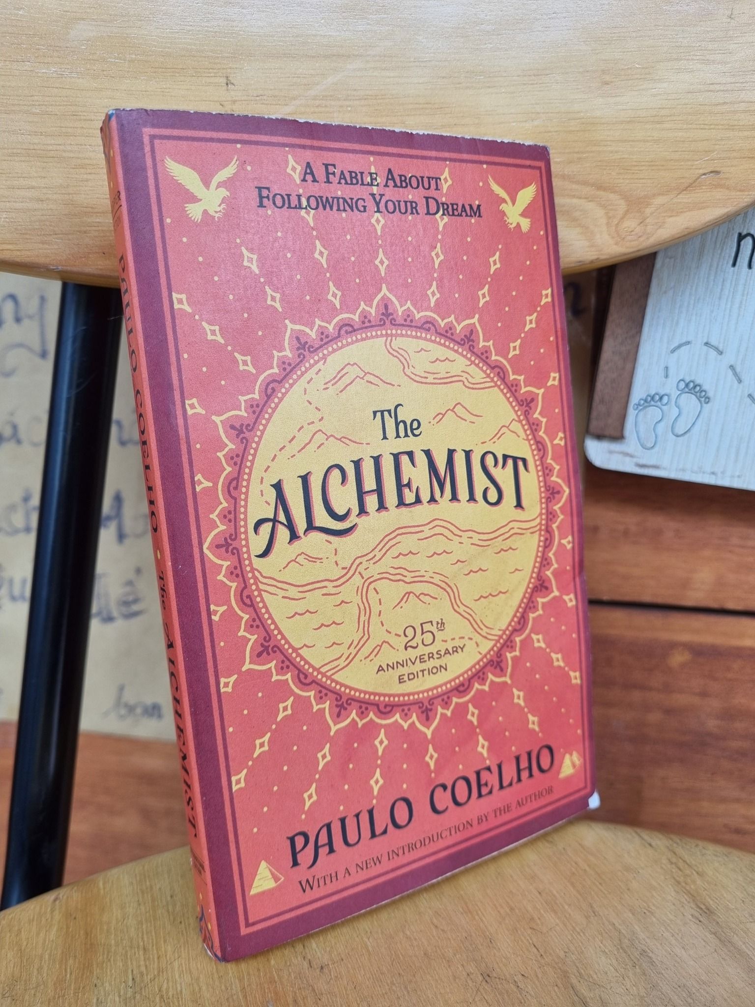 THE ALCHEMIST - PAULO COELHO - 25TH ANNIVERSARY EDITION – Momo Bookstore
