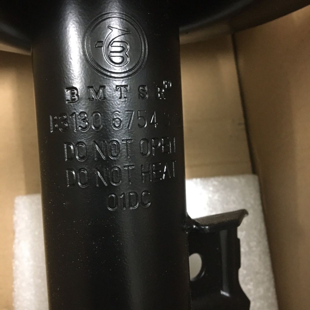 Giảm xóc trước phải Bmw X5 E53 hàng BMTS mã 31306754342, 31316764604 ...