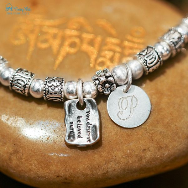 Vòng siêu chú tết dây đỏ charm bát nhã