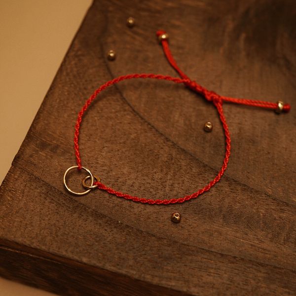 INTERLOCKING CIRCLE LUCKY STRING S A T E L L I T E