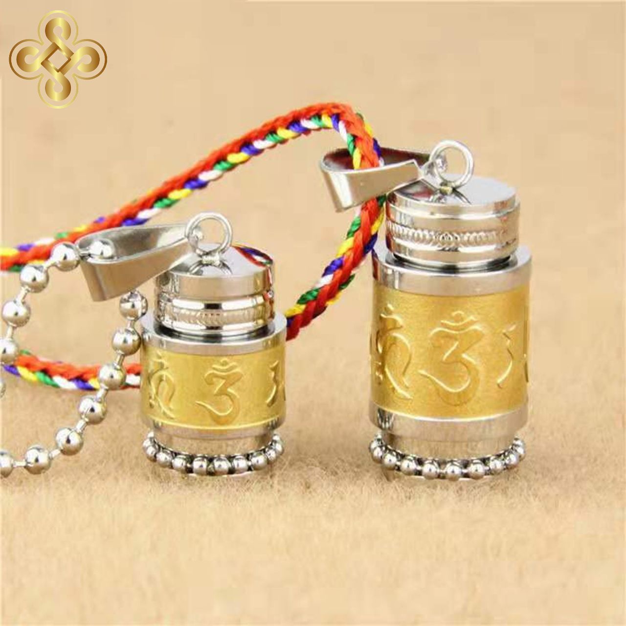 กล่องพระหลอดหมุนได้บรรจุสัญลักษณ์คาถาหกอัน – Mango Amulet